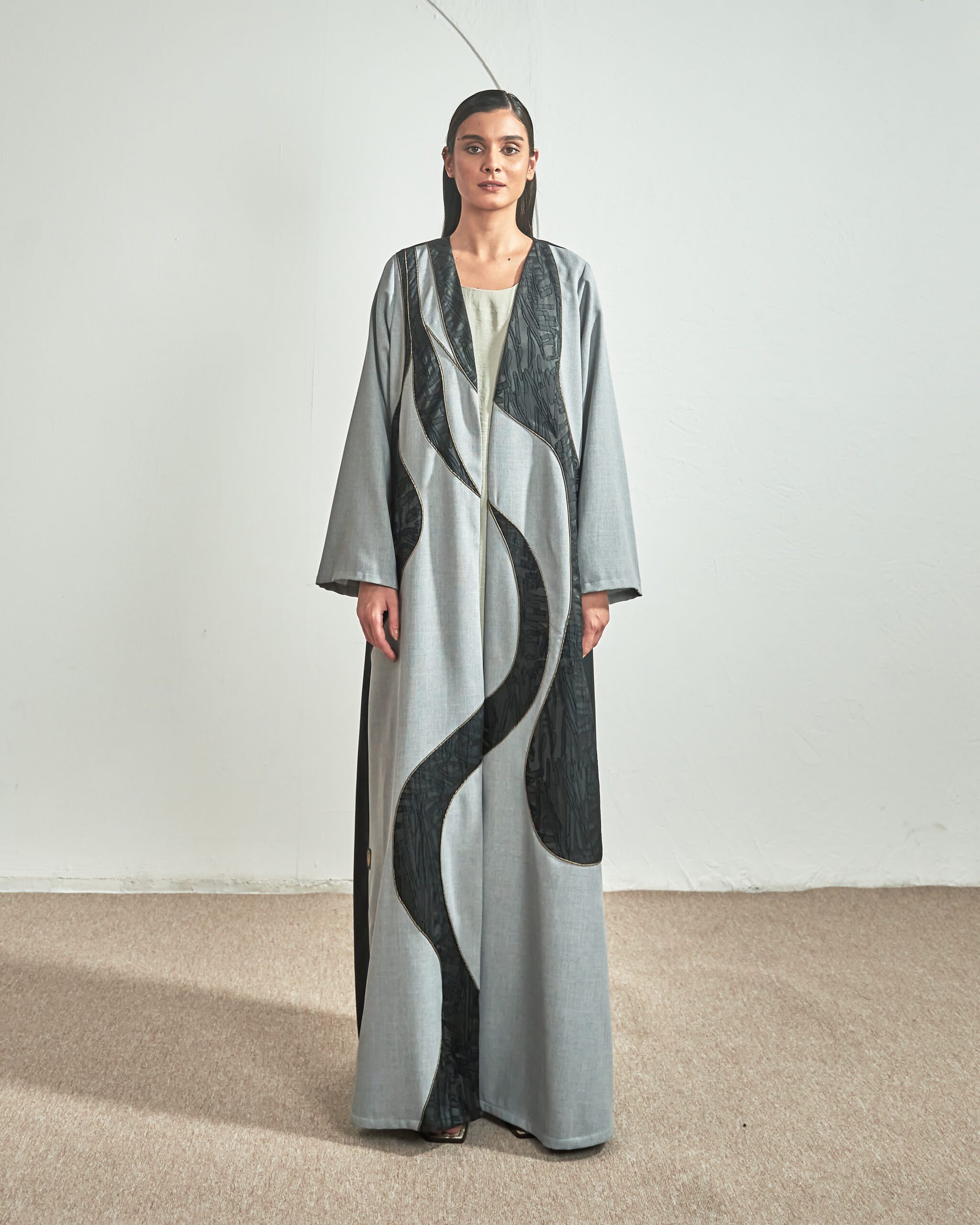 A CURVY SHAPED, PATCHED ABAYA – The Orphic